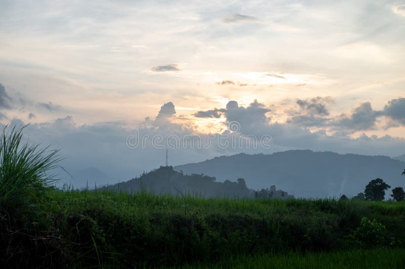 The Sun Hiding Behind Thick Clouds Makes for a Dramatic View of the Sky ...