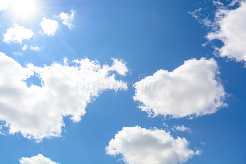 The Sun and Clouds on the Beautiful Blue Sky. Partly Cloudy Stock Image ...