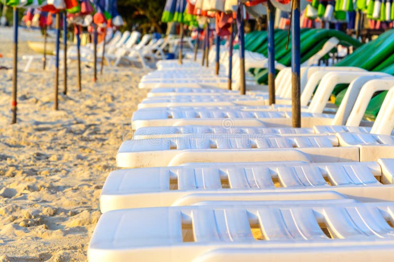 Sunbath seats on the beach stock image. Image of seats - 48924213