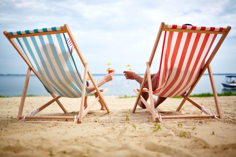 Sunbathers toasting stock image. Image of summer, couple - 56006599