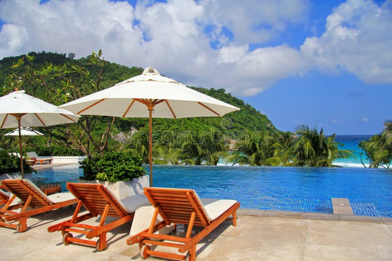 Sunbathing Beds at the Swimming Pool Stock Image - Image of climate ...