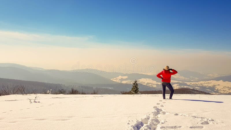 Sunbathing in winter editorial stock image. Image of snow - 137973099