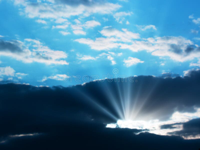 Sunbeam through the clouds stock image. Image of sunshine - 8868571