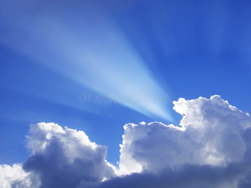 Sunbeam through the clouds stock photo. Image of sunlight - 36810268