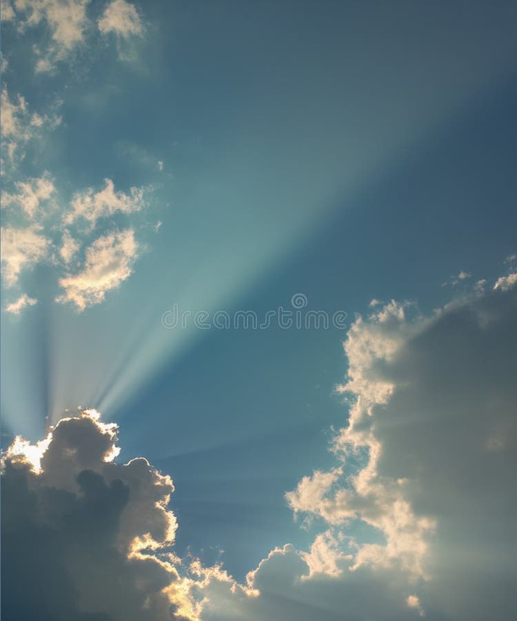 Sunbeam through the Haze on Blue Sky, Vertical Stock Photo - Image of ...