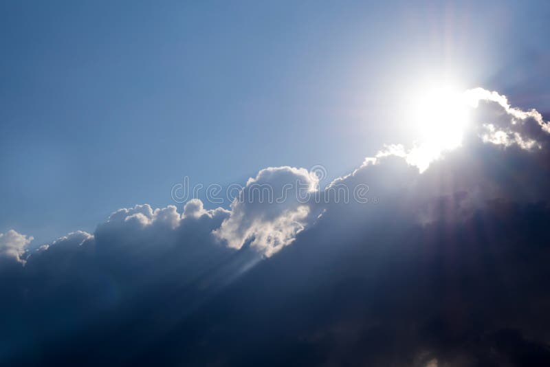 Sunbeam of the Sun Behind the Clouds Stock Image - Image of cloud ...