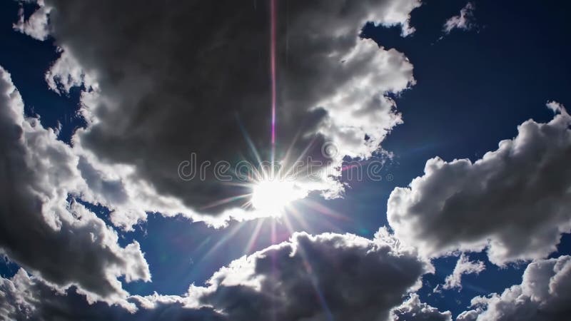 Sunbeams Breaking through Dramatic Dark Clouds in Blue Sky, Nature and ...