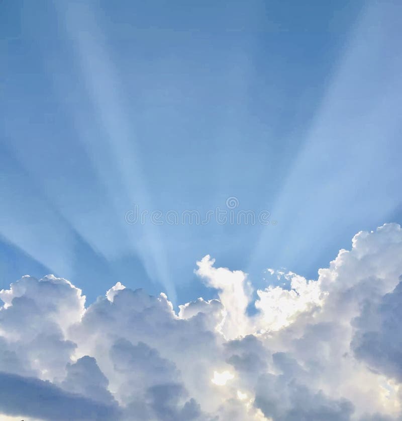 Sunbeams stock photo. Image of sunbeams, blue, clouds - 146118814