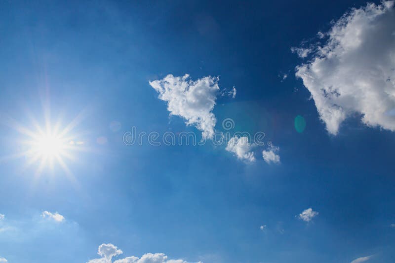 Sunbeams with white clouds stock image. Image of copy - 166499863