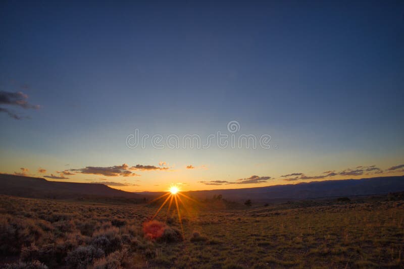 Sunburst Landscape at Sunset with Mountains Stock Image - Image of ...