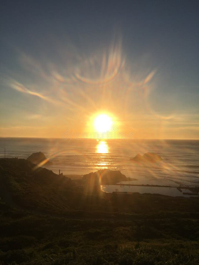 Sunburst at Ocean Beach stock photo. Image of beach - 100365384