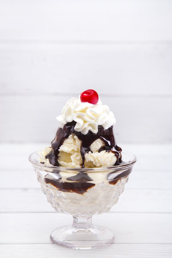 Sundae on a Rustic Wood Table Stock Photo - Image of treat, sundae ...