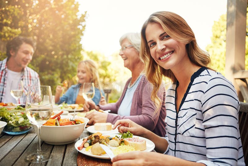 Sunday Brunch with My Favorite Bunch. Portrait of a Happy Woman ... Sunday Brunch with My Favorite Bunch. Portrait of a Happy Woman ...