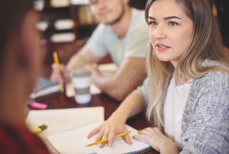 Sundents at the library stock image. Image of textbook - 97589729