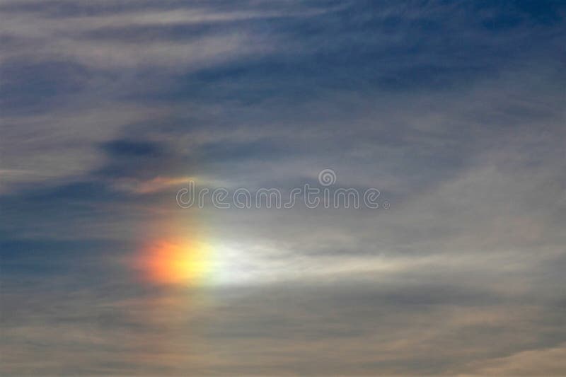 Sundog Visible within the Clouds and Blue Sky Stock Photo - Image of ...