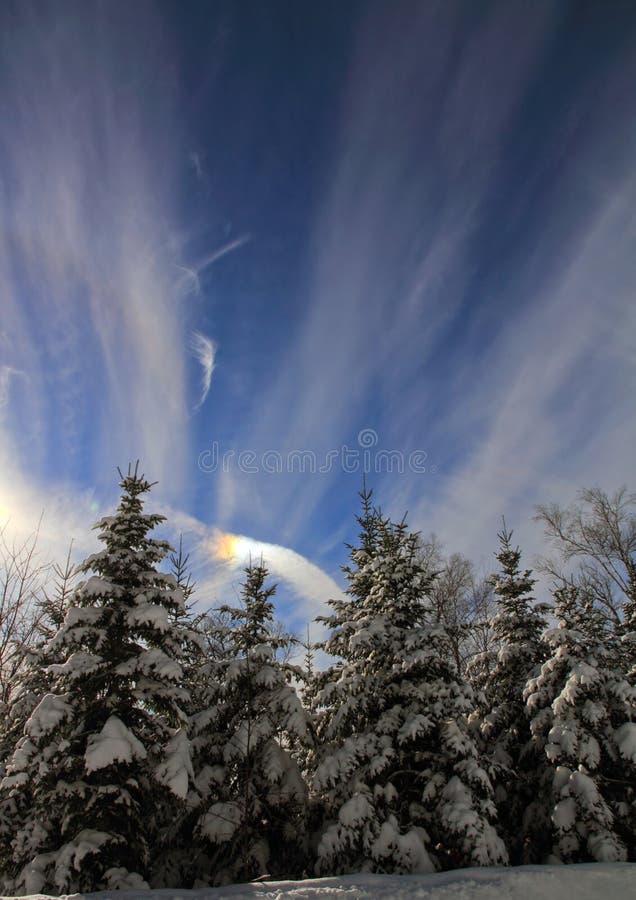 Sundog in Clouds during Snowfall Stock Image - Image of clouds, sundog ...