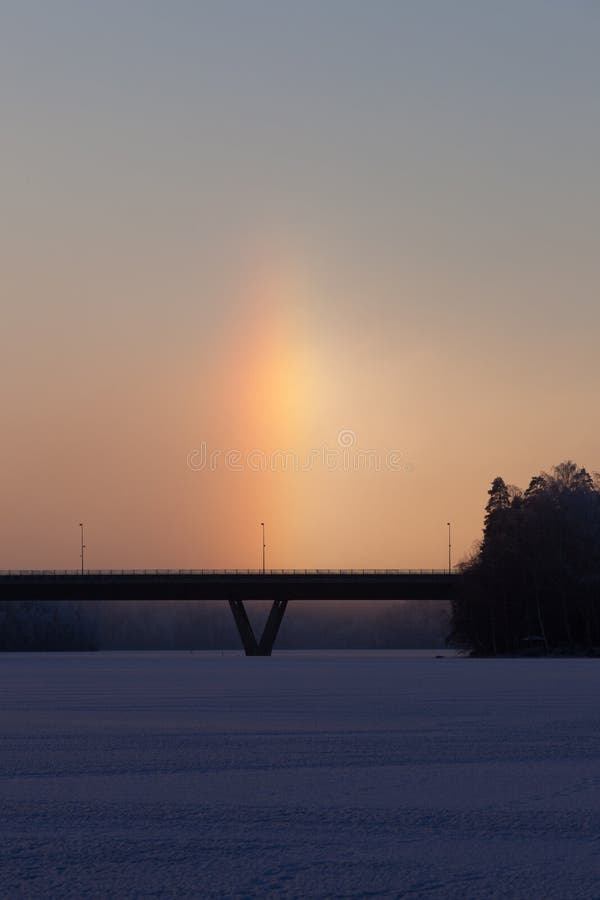 Sundogs at winter on lake stock photo. Image of weather - 119451270