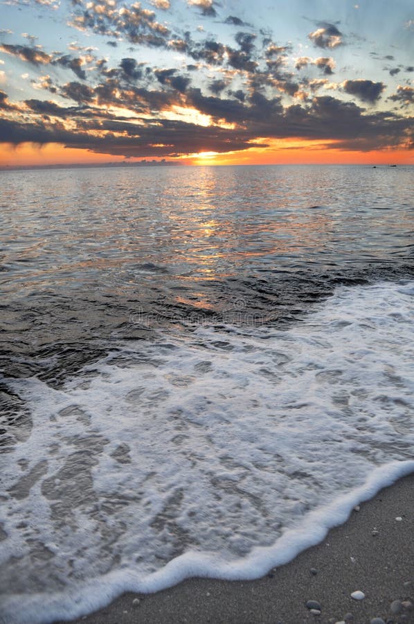 Sundown on the beach stock image. Image of beach, sunset - 22625603