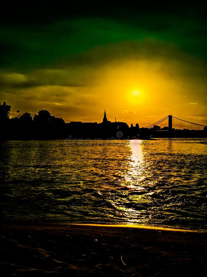 Sundown Over the Riverside of the River Rhein in Cologne with Dark Sky ...