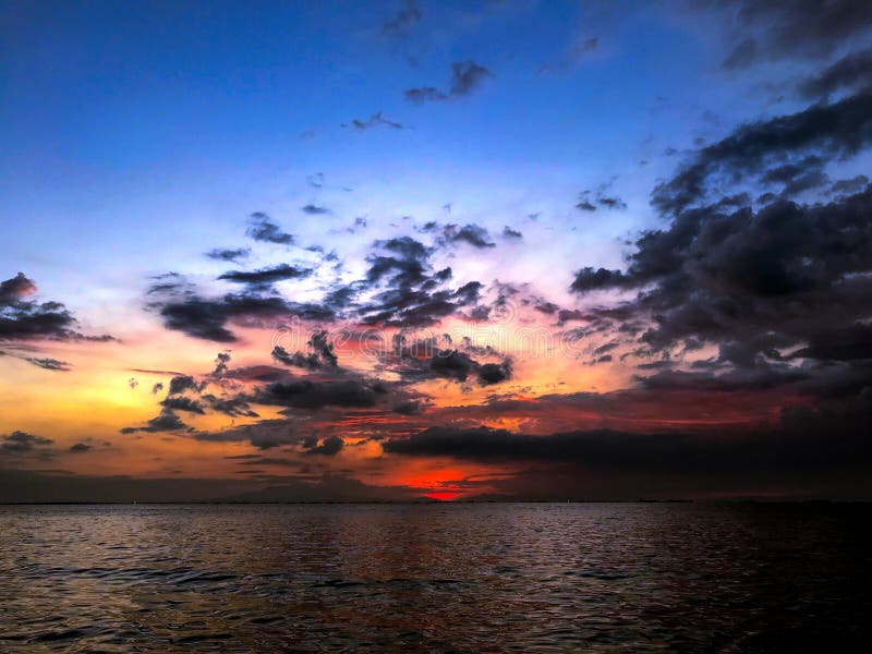 Sundown over the sea stock image. Image of night, cover - 130246707