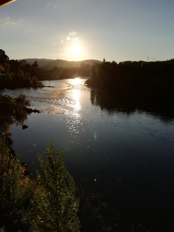 Sundown on the river stock image. Image of reflecting - 129286537