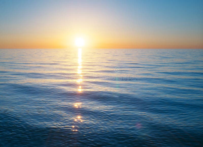 Sundown on the sea stock photo. Image of beautiful, beach - 130944778