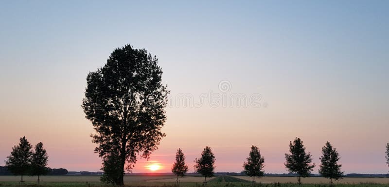 Sundown sunset stock image. Image of sunset, landscape - 122146933