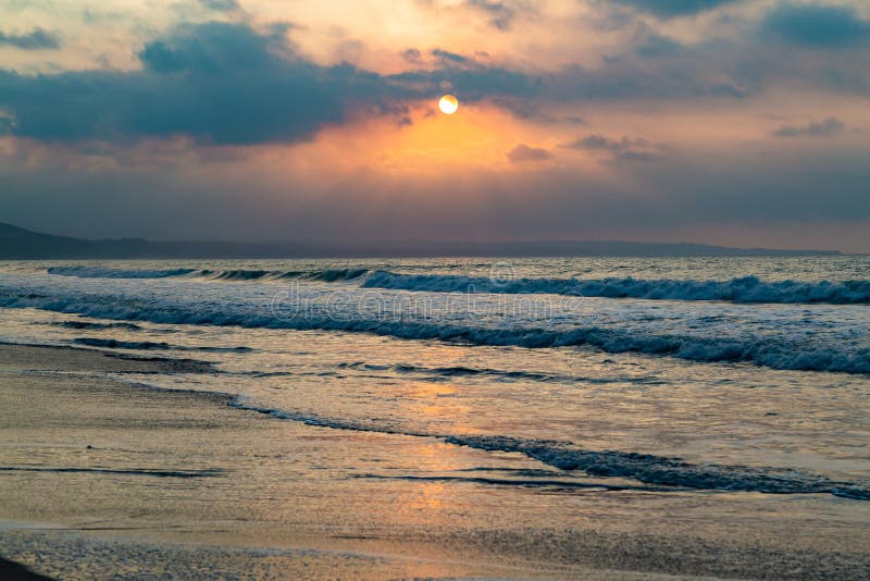 Sundown or sunset stock image. Image of beach, sand - 134128445