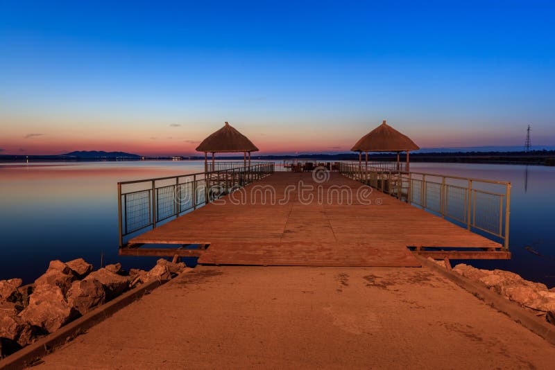Sunet over lake stock image. Image of pontoon, orange - 82141389