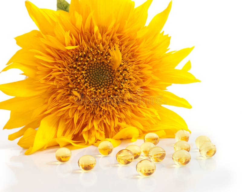 The Sunflower and Capsules with Vitamins a and E Stock Photo - Image of ...