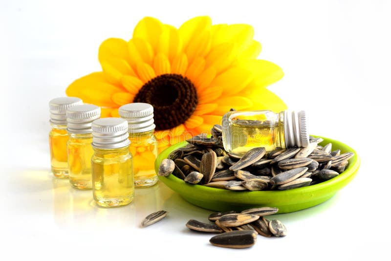 Sunflower Seed with Drop of Oil in the Bottle. Stock Photo - Image of ...
