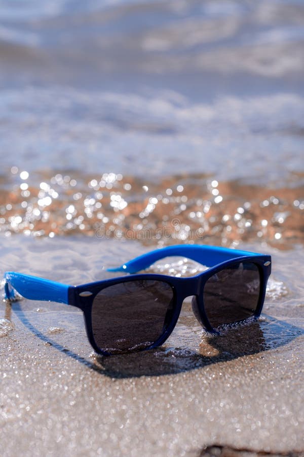 Sunglasses on the Beach. Concept Summer Beach Holiday. Stock Photo - Image of beachwear, leisure ...