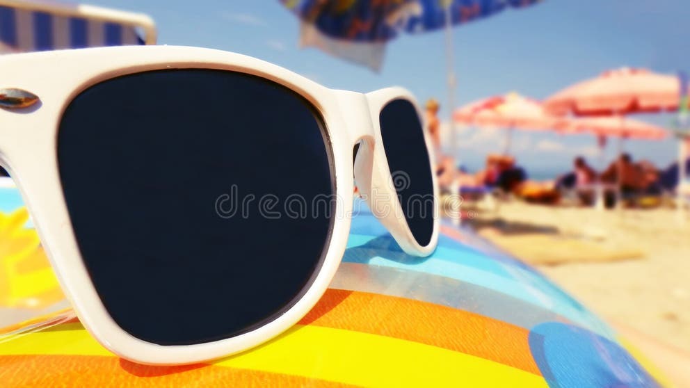 Sunglasses on the beach stock image. Image of sunglass - 39565795