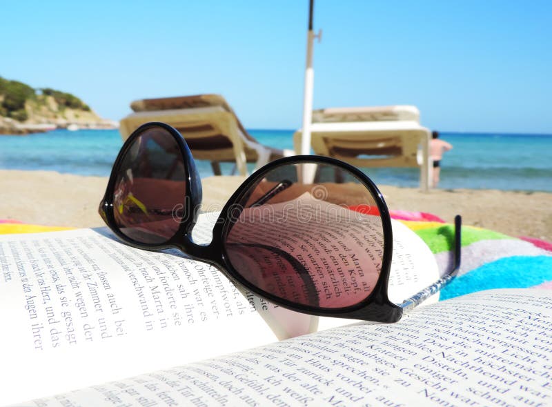 Sunglasses and book stock image. Image of travel, colored - 68975033