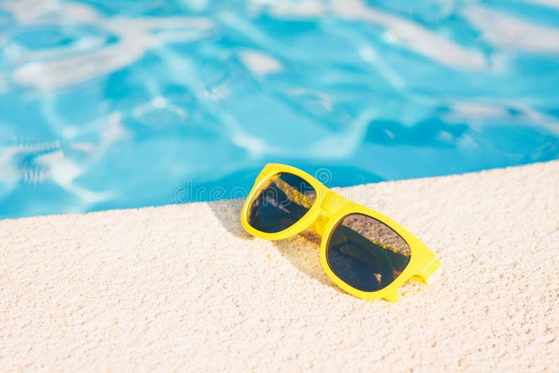 Sunglasses Lying Around Pool Stock Photo - Image of happy, luxury ...
