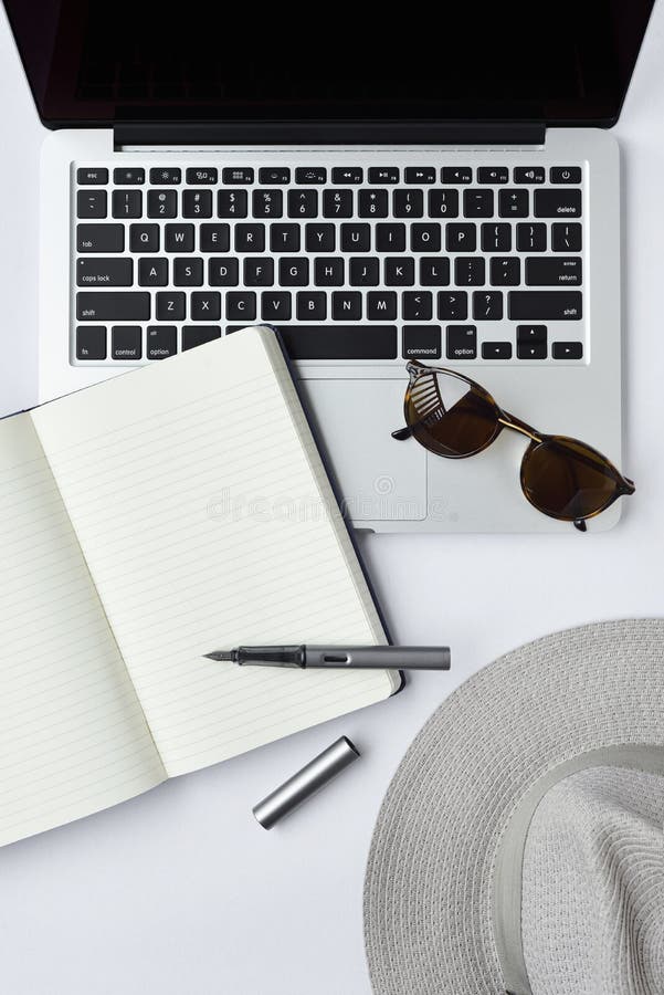 Sunglasses, Notebook, Pen, and Computer Keyboard on White Background ...