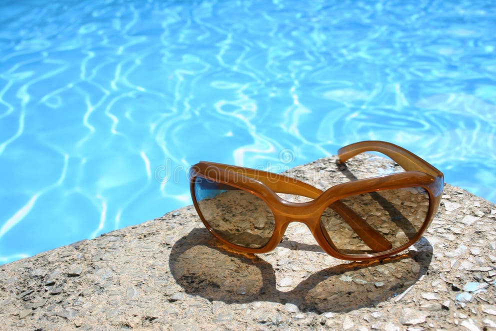 Sunglasses by Pool stock photo. Image of sunbathe, retro - 128976