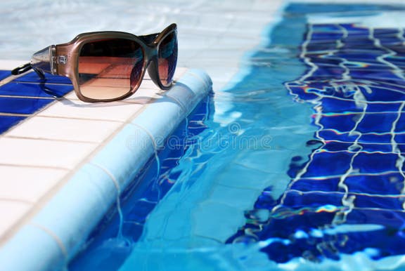 Sunglasses by Pool stock photo. Image of vacation, idyllic - 2167604