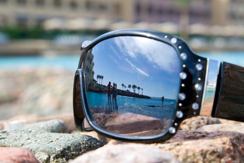 Sunglasses with Reflection of Sea Stock Image - Image of resort ...