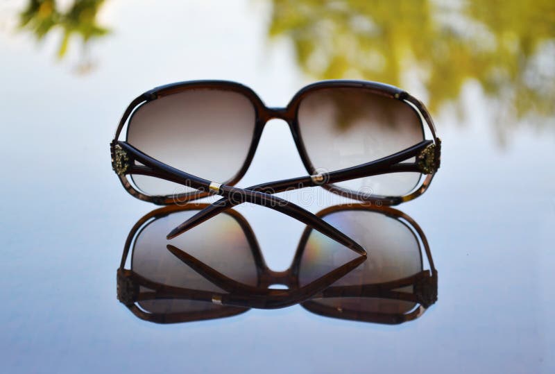 Sunglasses Reflection on Table Stock Image - Image of optics, single ...