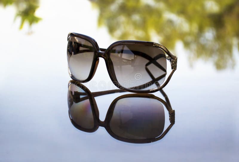 Sunglasses Reflection on Table Stock Image - Image of stylish ...