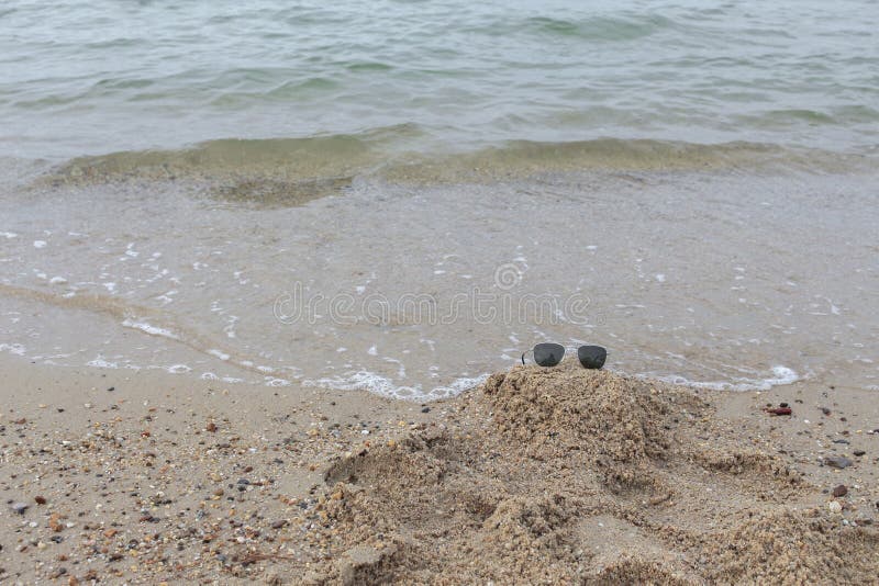 Sunglasses Select Focus with Shallow Depth of Field on Beach Sand Stock ...