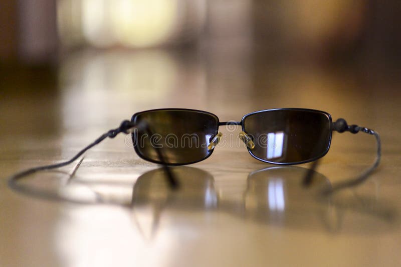Sunglasses on a table stock photo. Image of chic, sunglasses - 78772178