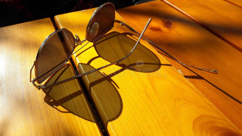 Sunglasses on the table stock photo. Image of summer - 123637626