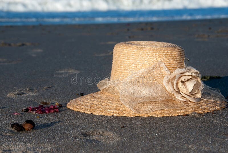 Sunhat on beach stock image. Image of waves, tourist - 12989917