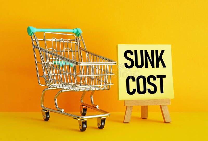 Sunk Cost is Shown Using the Text Stock Photo - Image of marketing ...