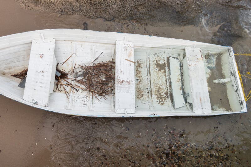 Sunken Rowboat on the Beach Stock Photo - Image of lonely, antique ...