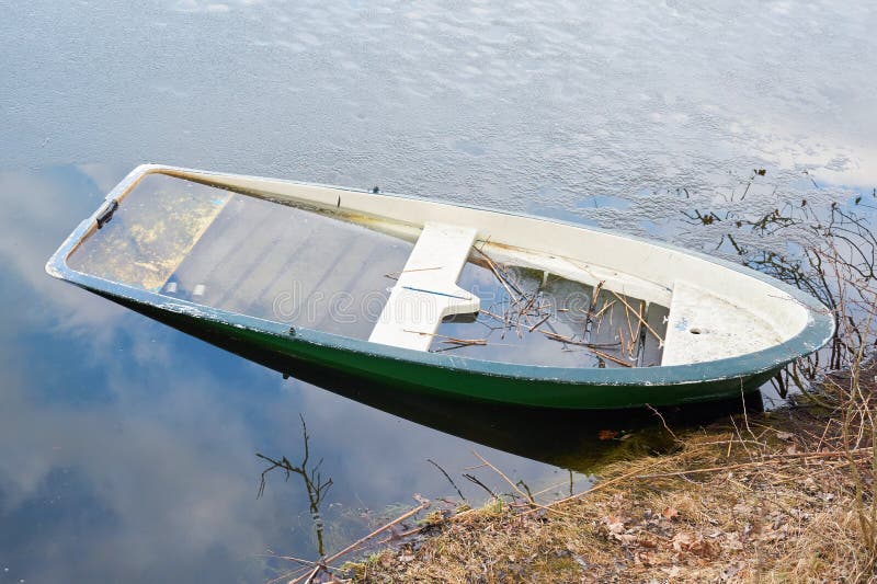 Sunken Rowing Boat in a Lake at Magdeburg Stock Image - Image of paddle ...