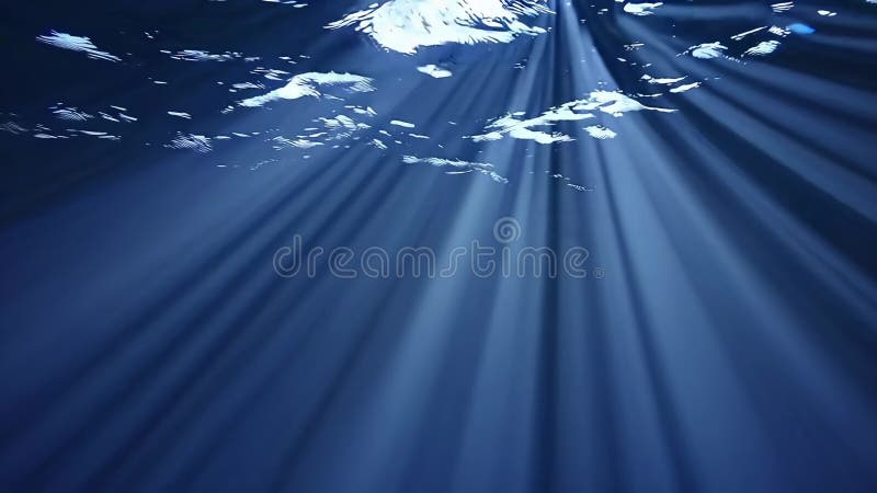 Sunlight Beams Piercing Deep Blue Ocean Waters, Underwater Tranquility ...