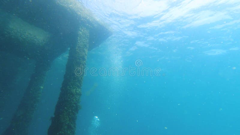 Sunlight Beams Shining from Above through the Deep Crystal Clear Blue ...